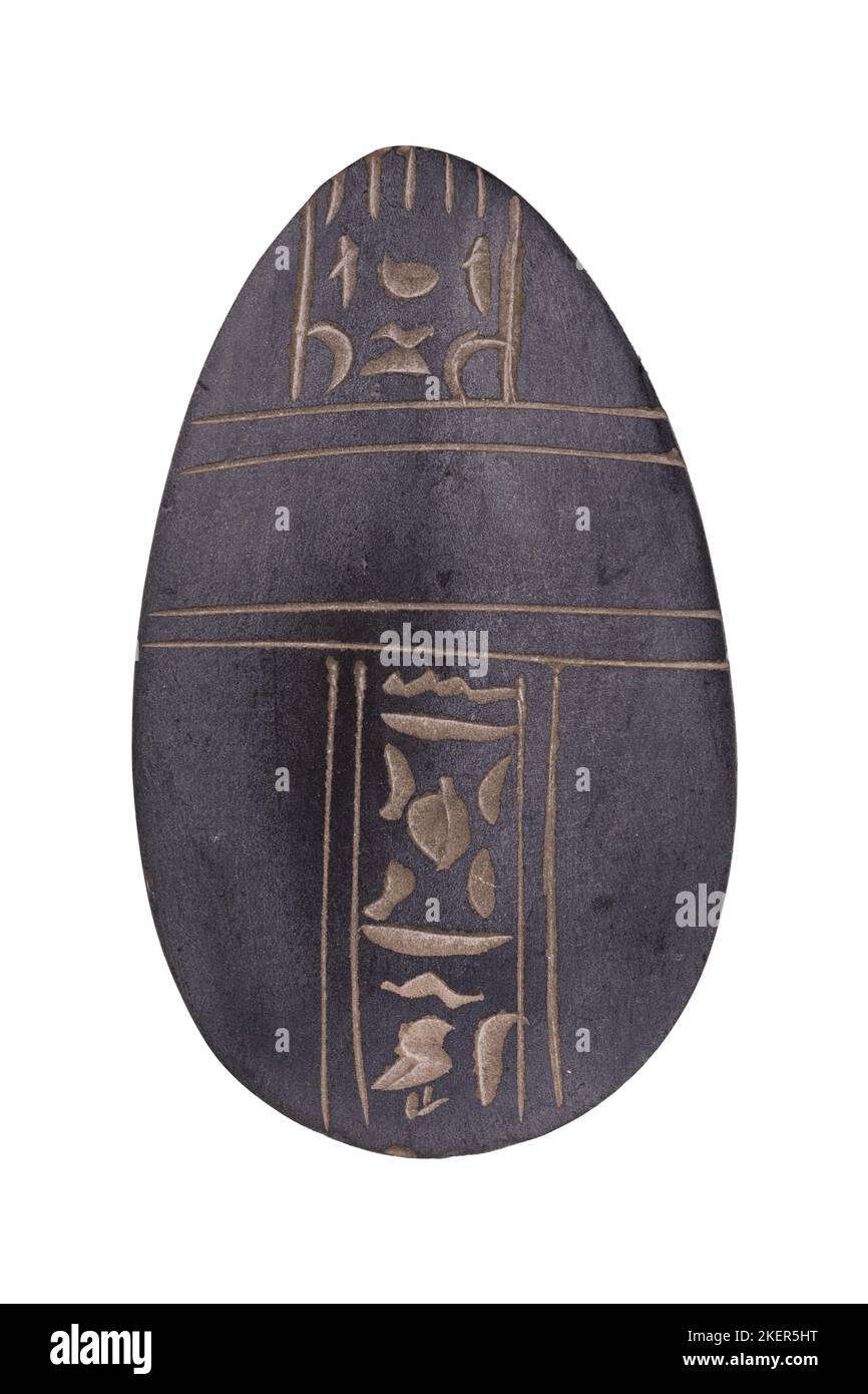 egyptian stone scarab with hieroglyphs isolated on white Stock Photo ...