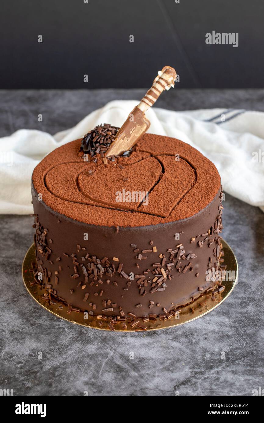 Chocolate birthday cake on dark background. close up Stock Photo - Alamy