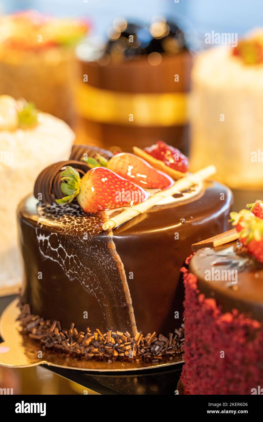 Types of cakes. Cakes displayed on the counter. Bakery products Stock ...