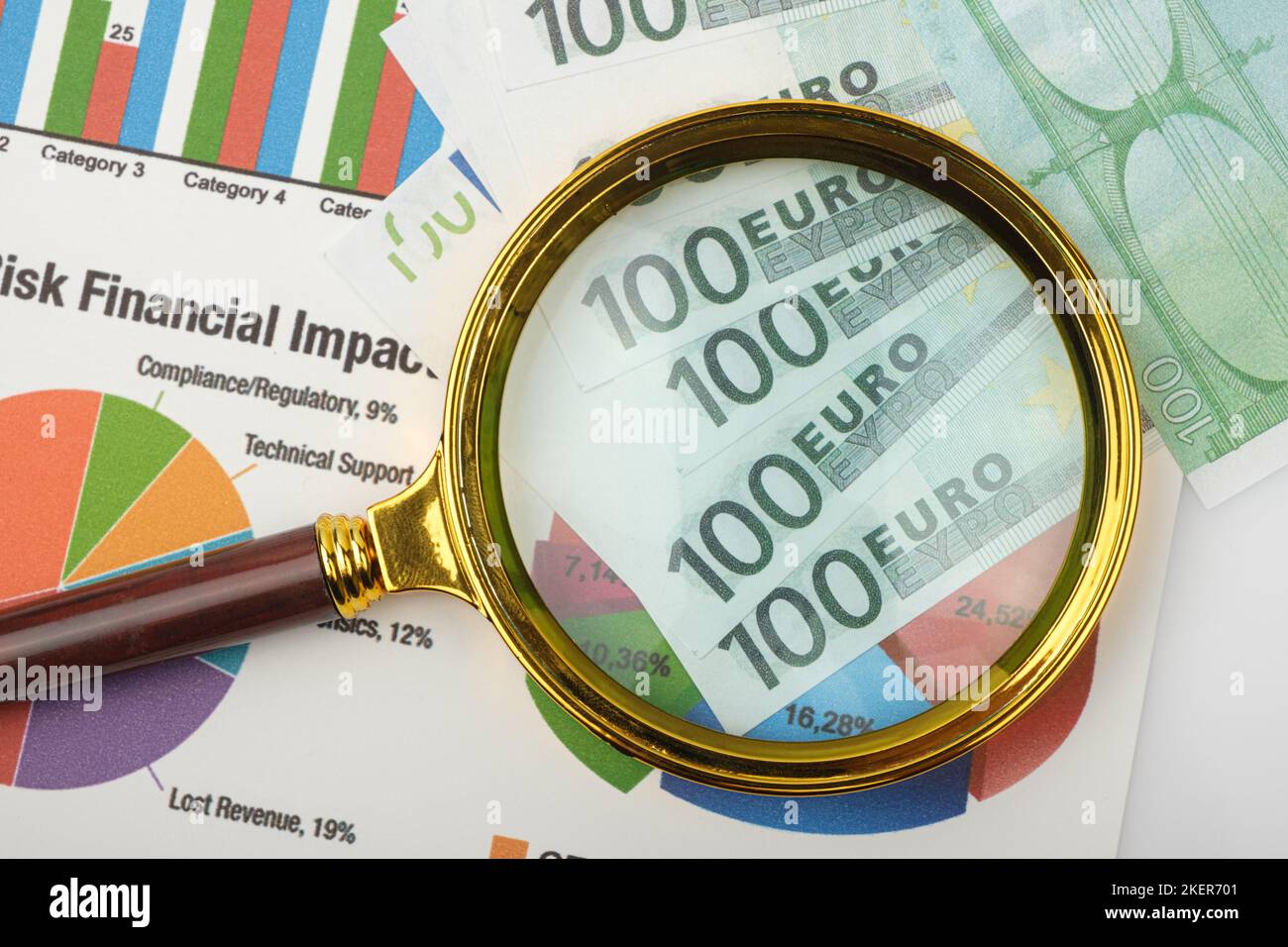 hand magnifier over euro banknote isolated on white background ...