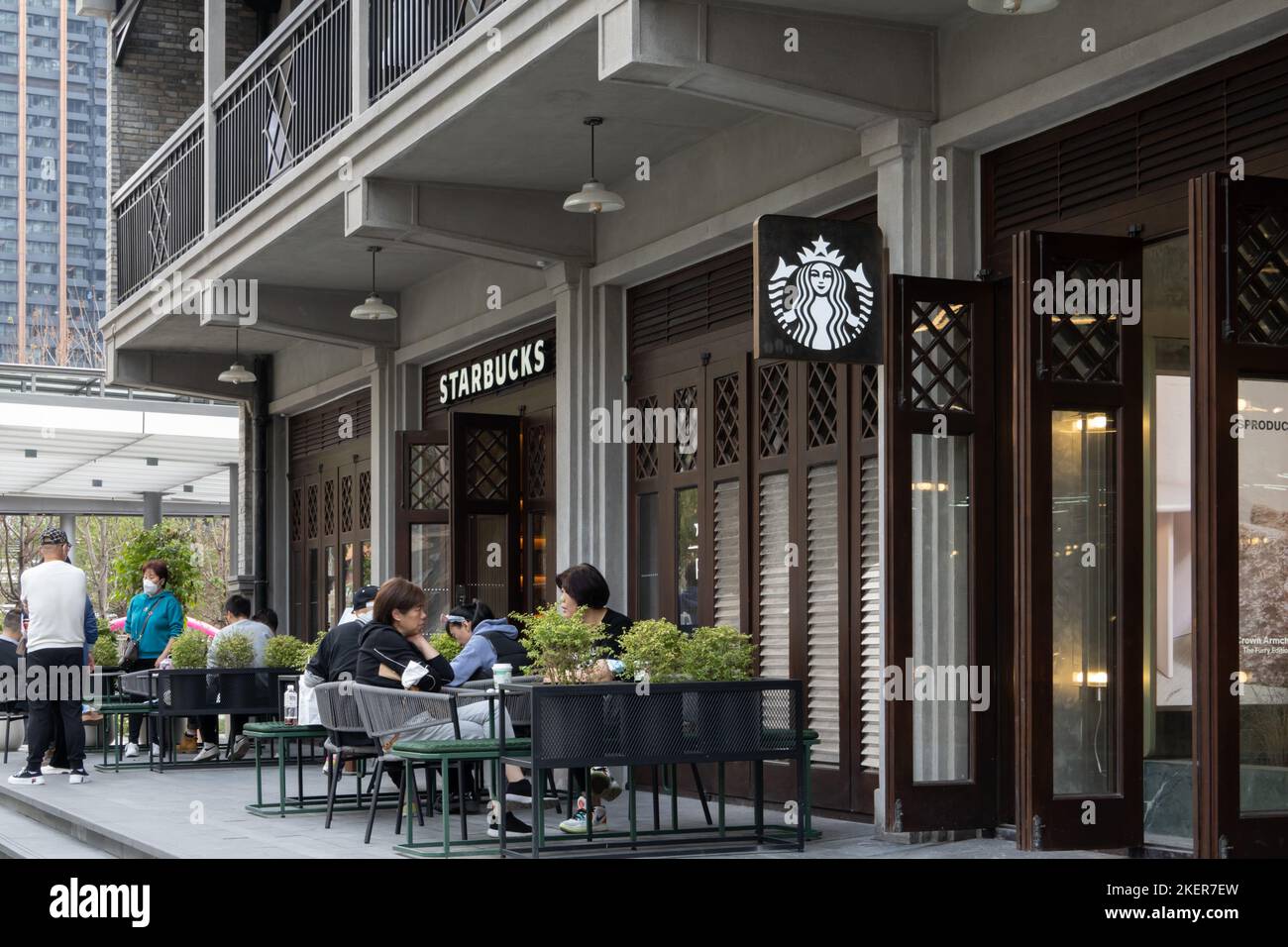 People are tasting coffee and chatting in the Starbucks Intangible ...