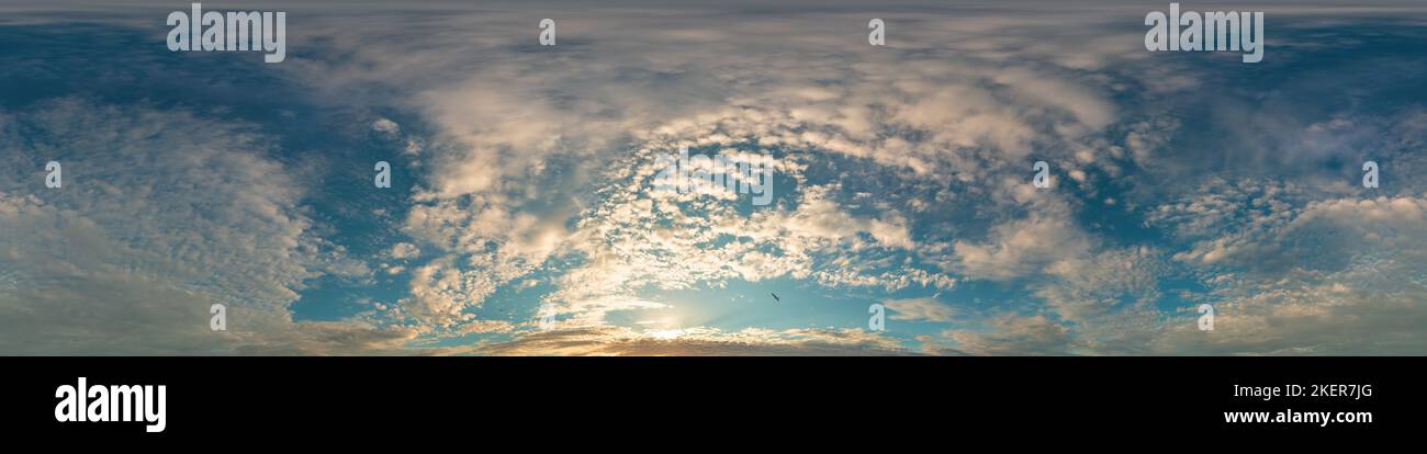 Dark blue sunset sky panorama with golden Cumulus clouds. Seamless hdr ...