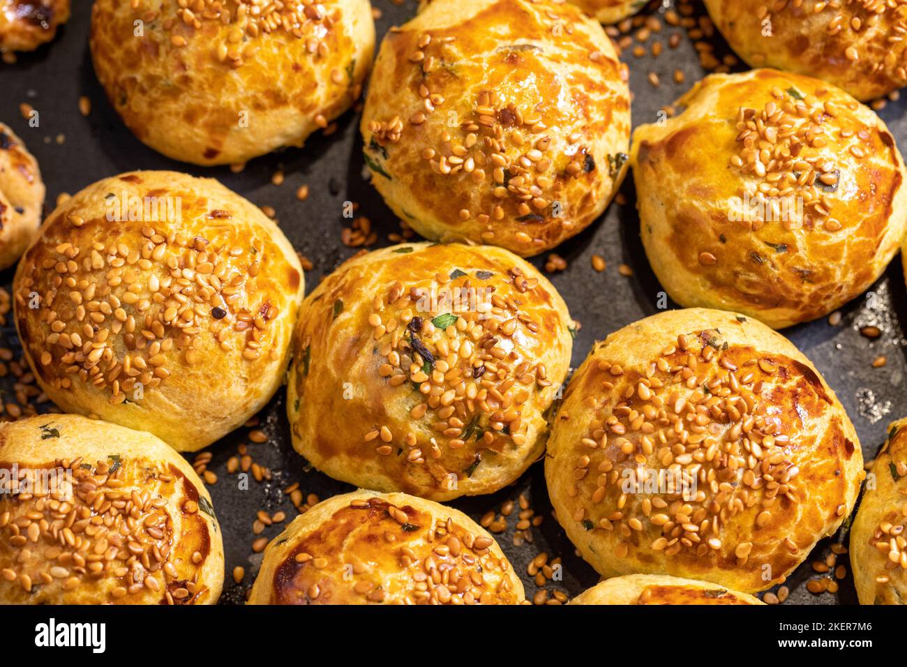 Sesame bun. Pogaca in a tray. close up Stock Photo - Alamy