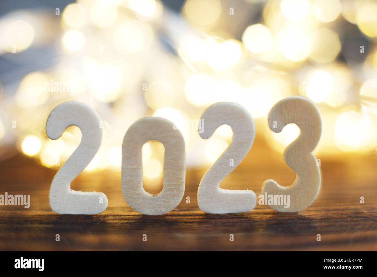 wooden number 2023 onchristmas beautifull shiny gold background ...