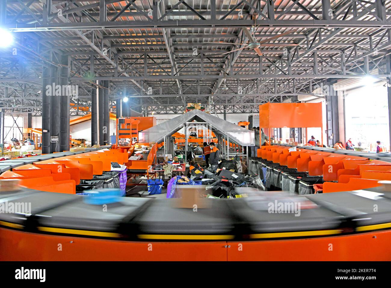 The Shunfeng Express workers are sorting parcels in the warehouse ...