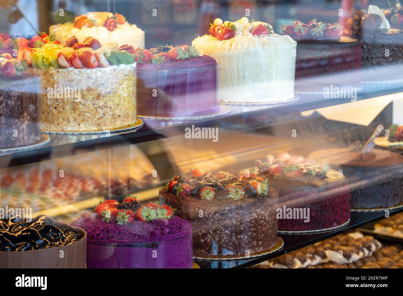 Types of cakes. Cakes displayed on the counter. Bakery products Stock ...