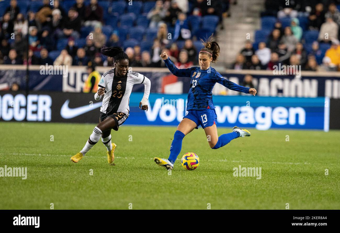 Alex Morgan (13) of USWNT controls ball during friendly match against ...