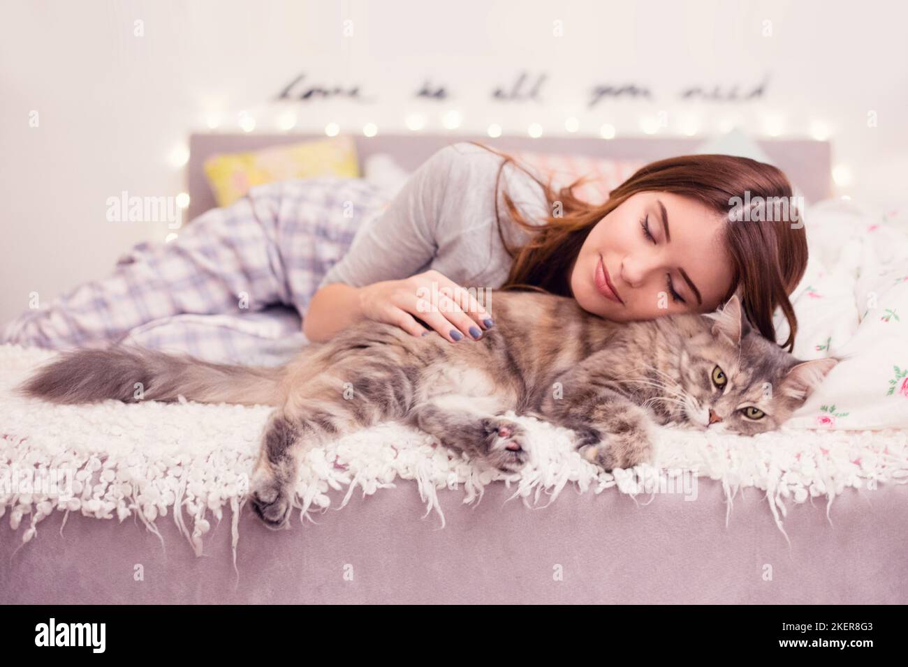 Woman cat indoors behavior hi-res stock photography and images - Alamy