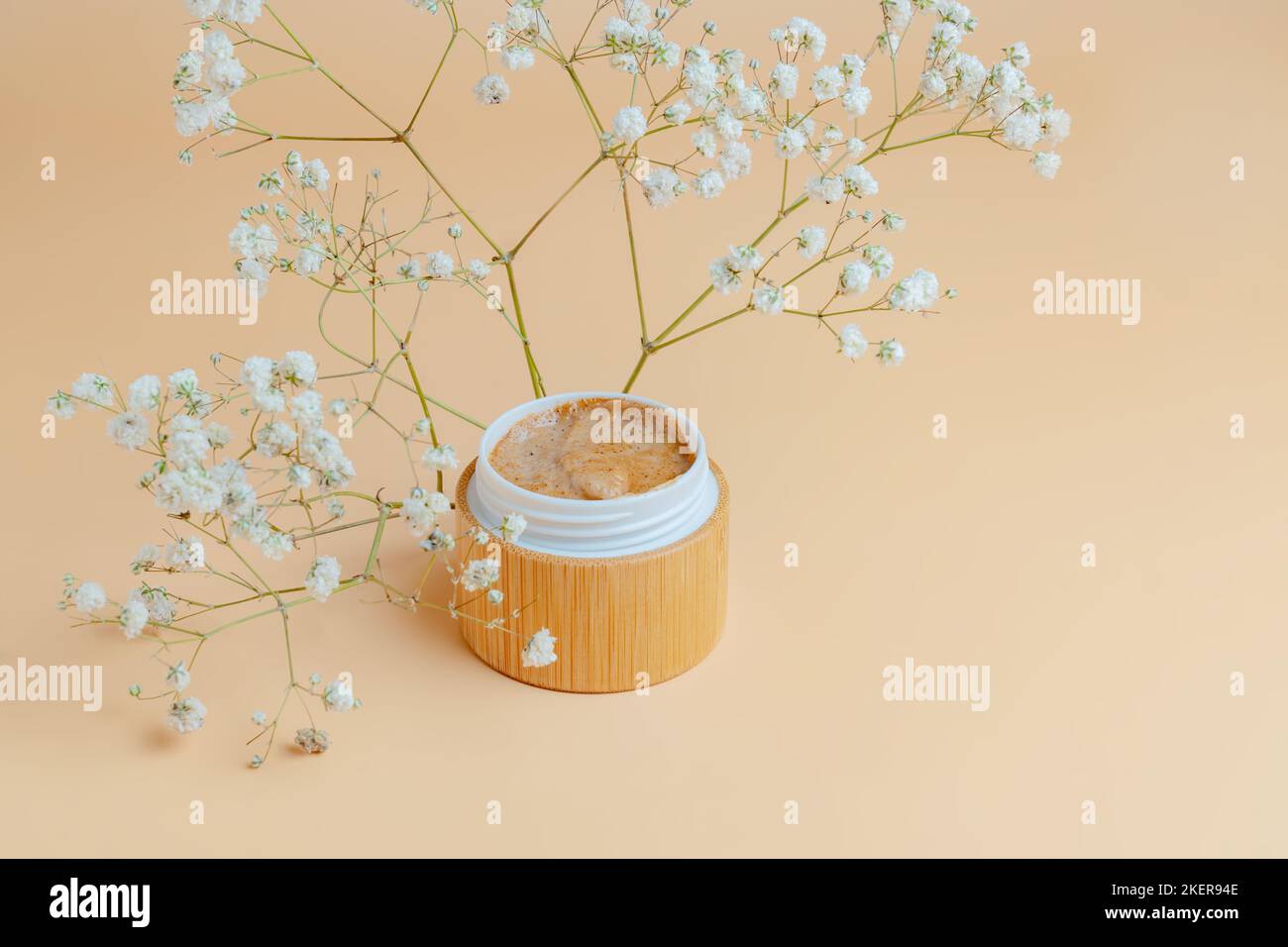 Natural body scrub on beige background. Cosmetic face cream bamboo ...
