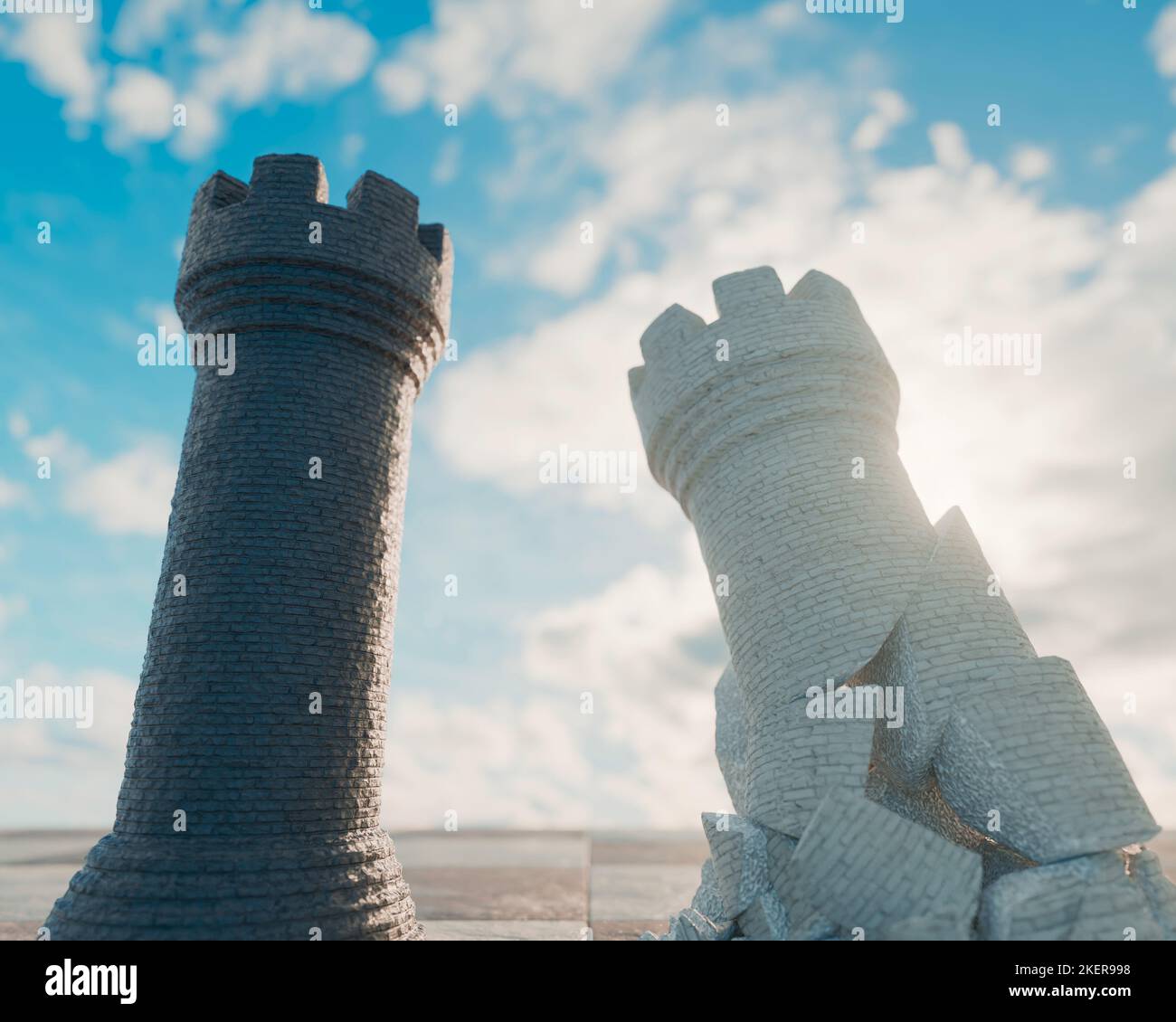 A black chess castle opposing a crumbling white castle on a chess board ...