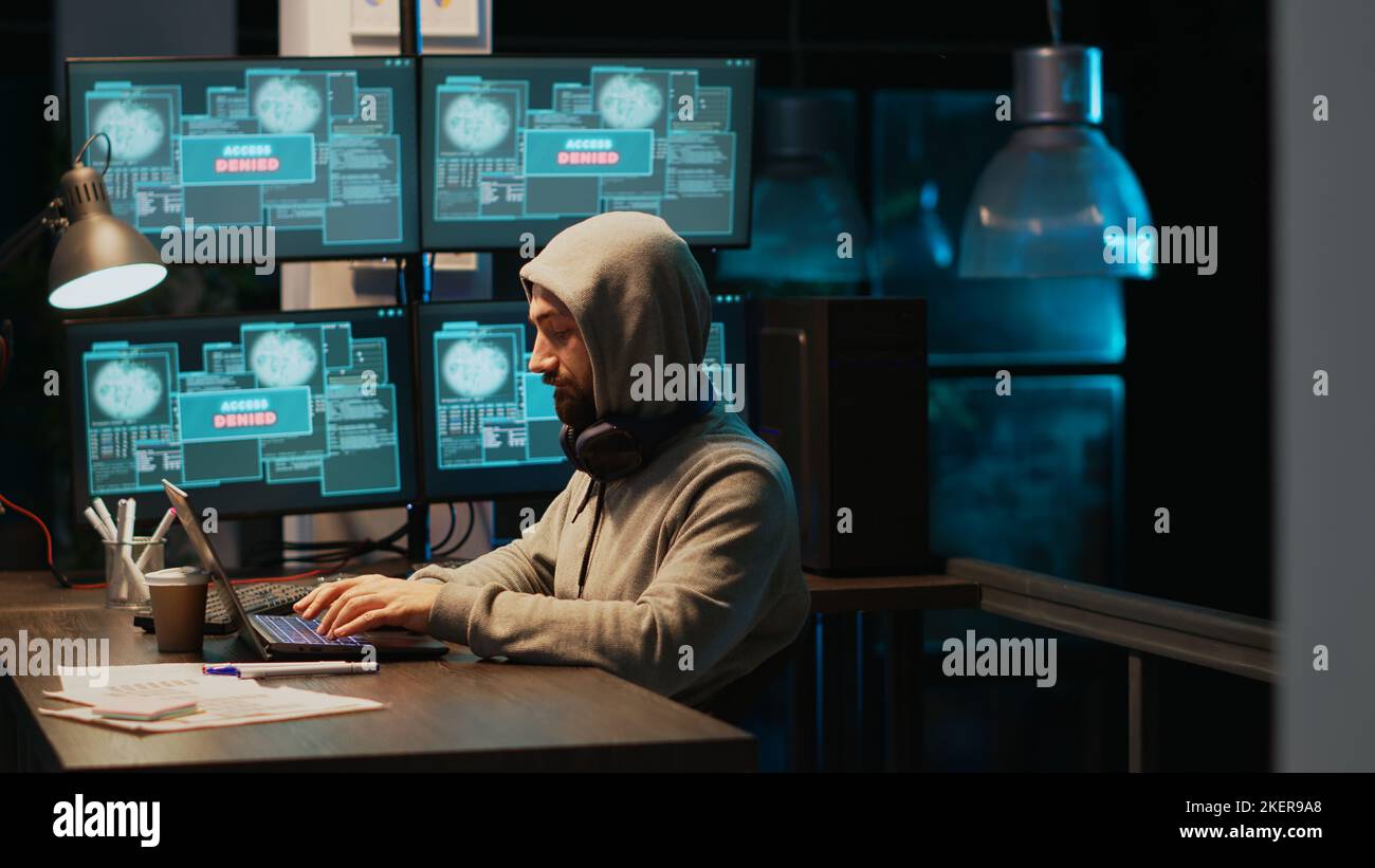 Young scammer trying to break database network, using virus to activate malware and steal IT ...