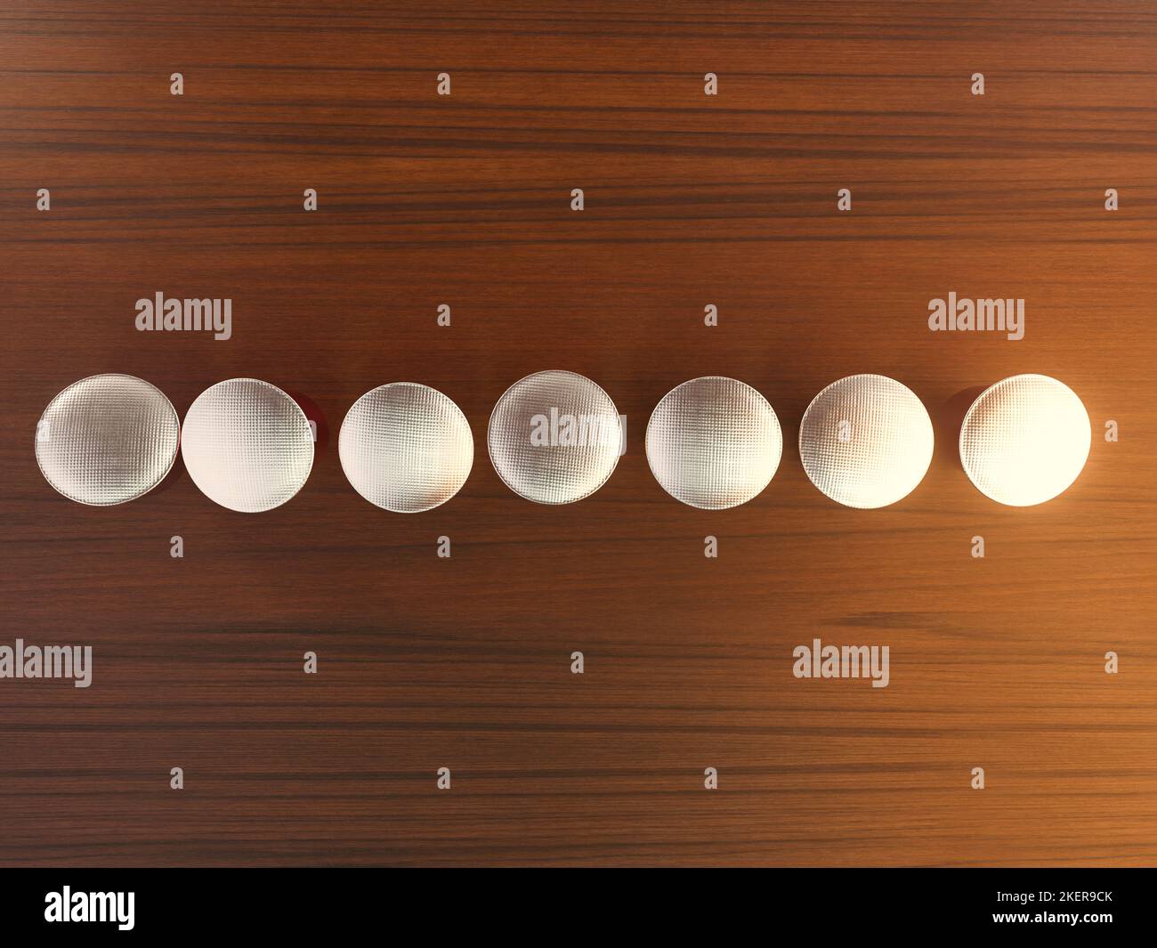 A closeup view of a row of colorful instant espresso coffee capsule ...