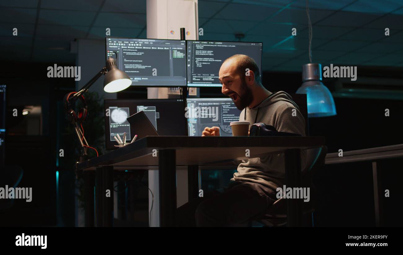 Software developer celebrating coding achievement and typing ... Software developer celebrating coding achievement and typing ...