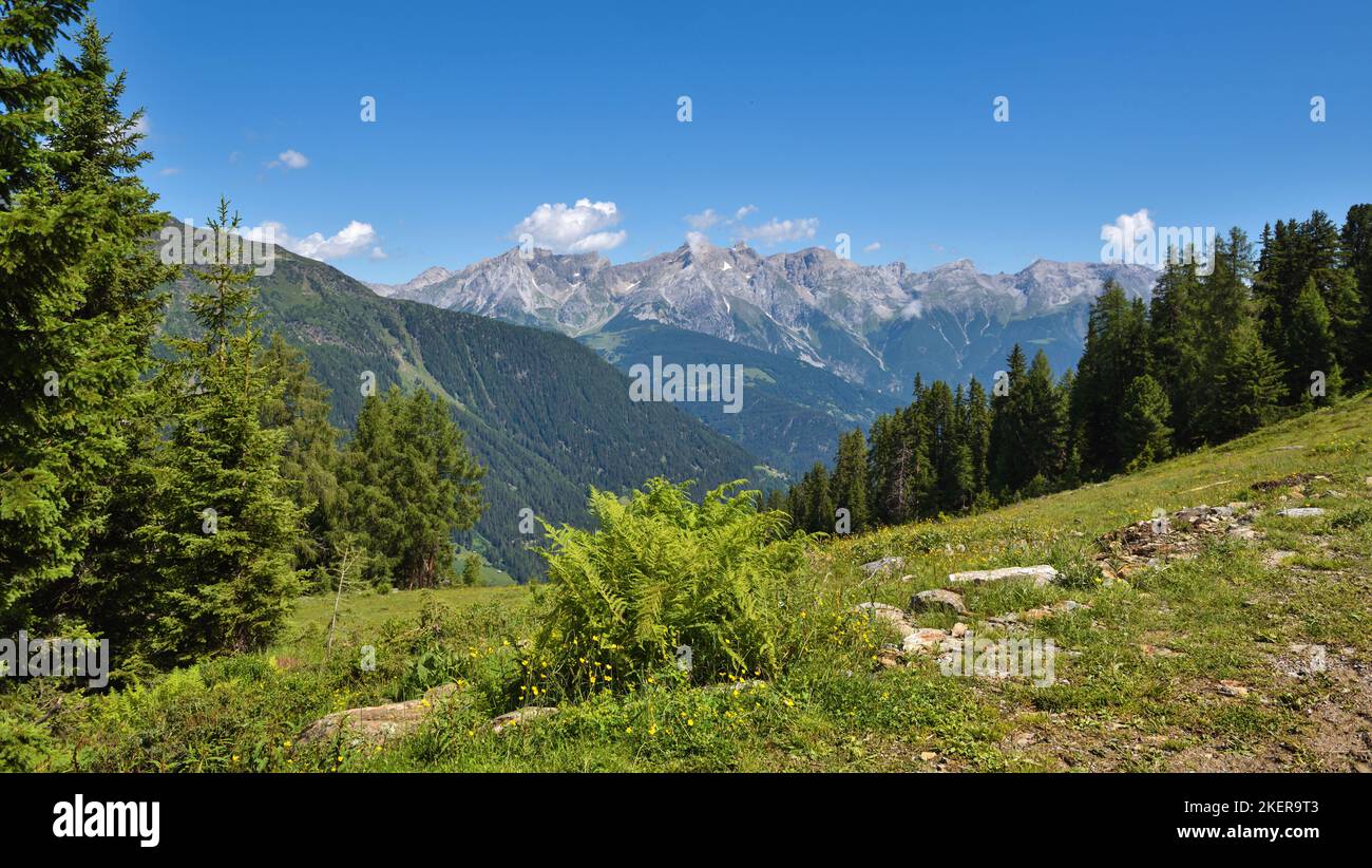 Summer landscape in mountains and blue sky with clouds. Location place ...