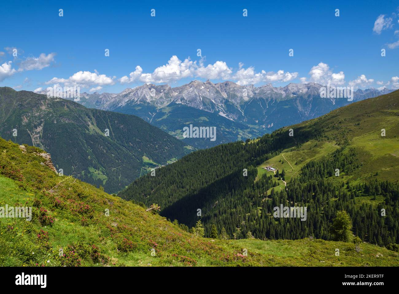 Summer mountain landscape and blue sky with clouds. Location place Alps ...