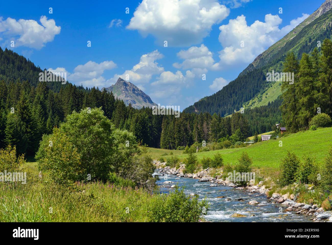Summer mountain landscape and blue sky with clouds. Location place Alps ...