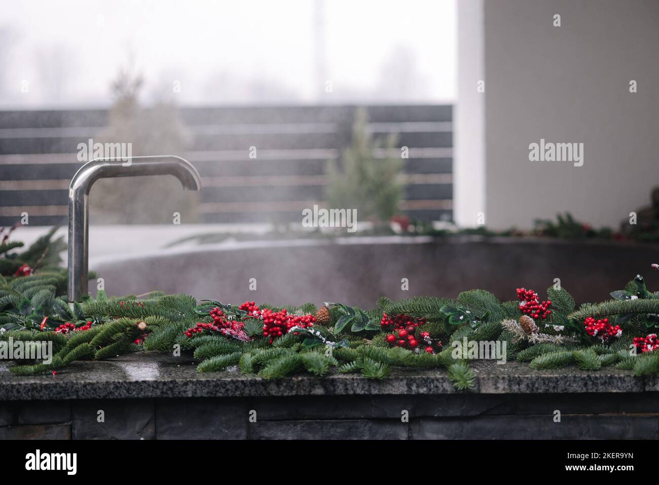 Place for relaxing in an outdoor hot tub decorated candles, Christmas ...