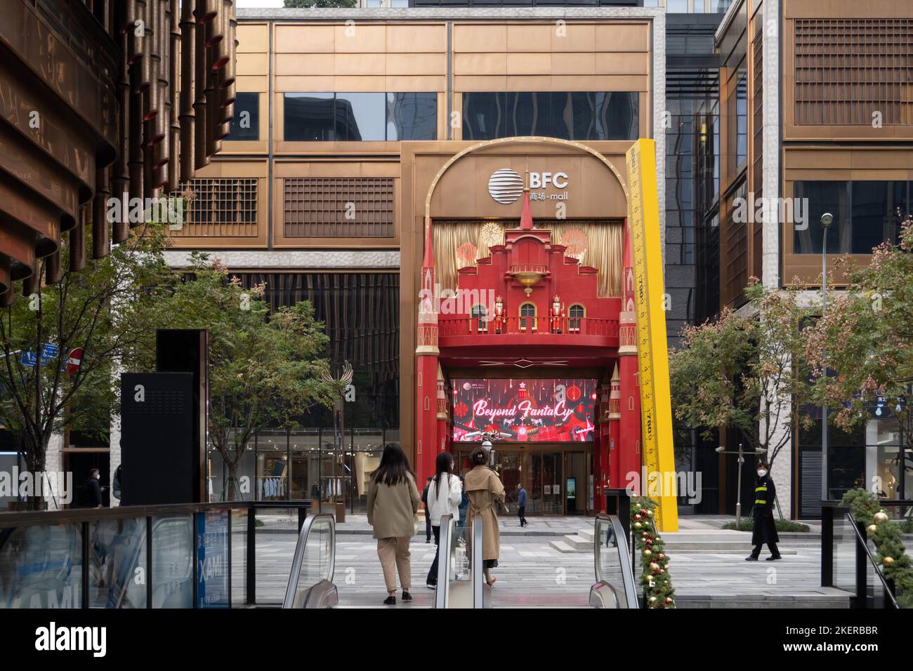 SHANGHAI, CHINA - NOVEMBER 14, 2022 - Golden Christmas trees and red ...