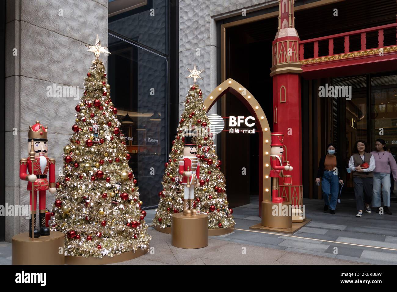 SHANGHAI, CHINA - NOVEMBER 14, 2022 - Golden Christmas trees and red ...