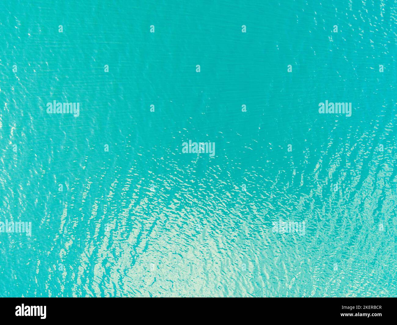 Aerial view of a Crystal clear sea water texture. View from above ...