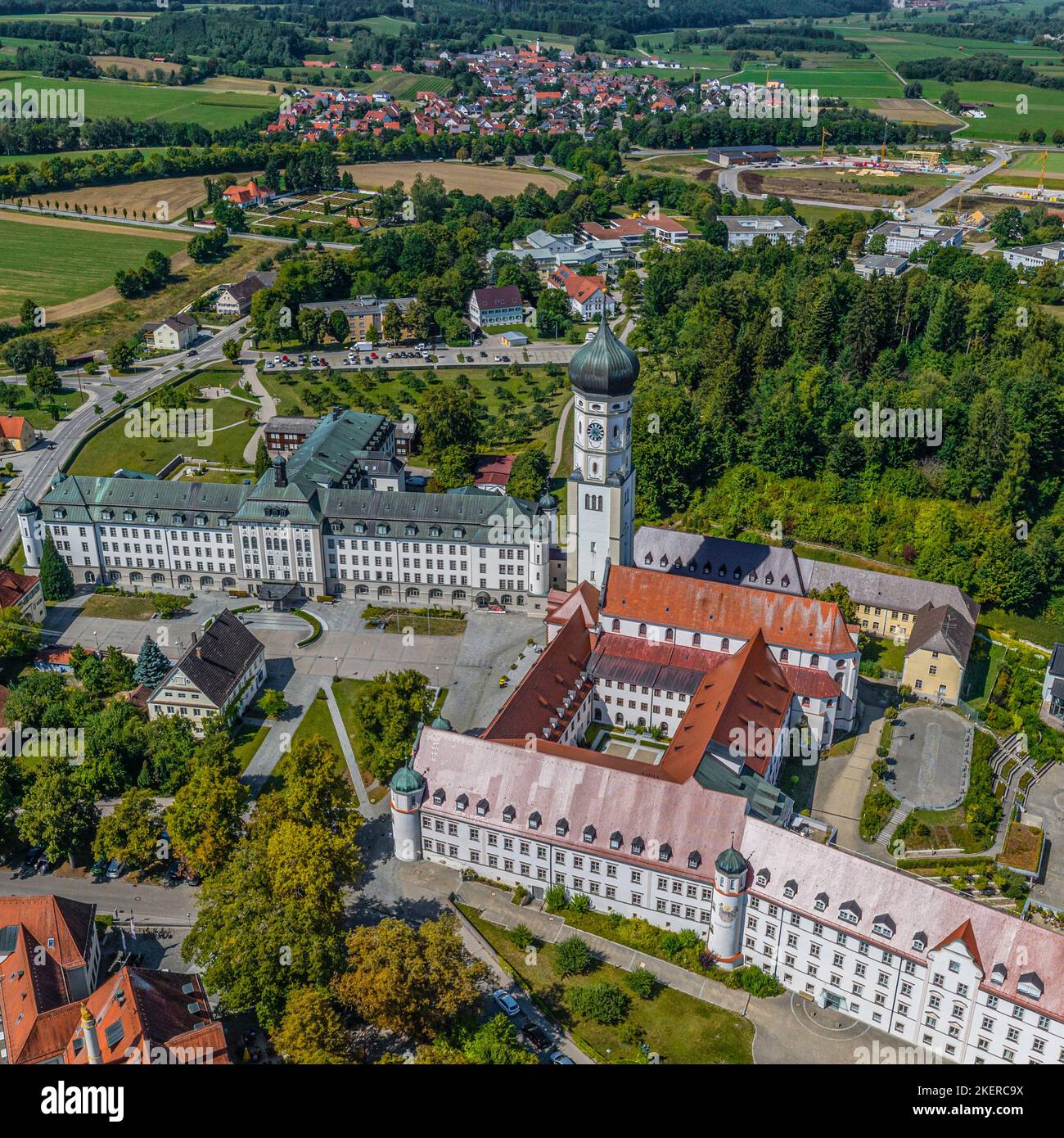 Aerial view to the village and monastry of Ursberg near Thannhausen in ...