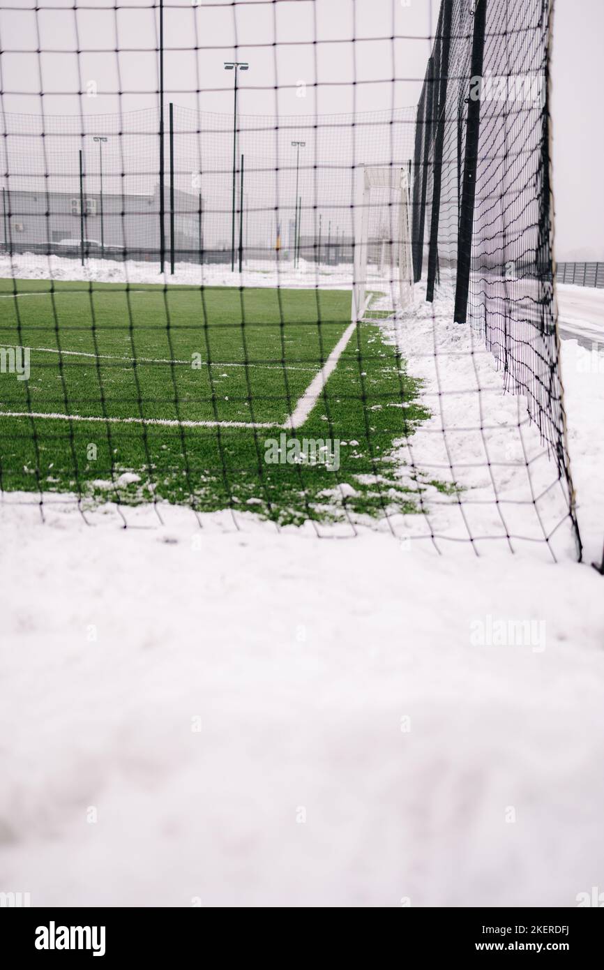 Football field is cleared of snow in winter time Stock Photo - Alamy