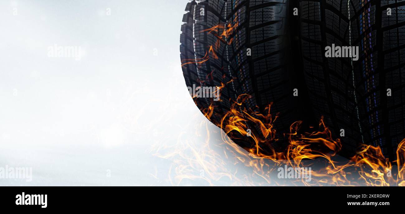 Close-up photo of Car tire on frame of fire background . Rubber product ...