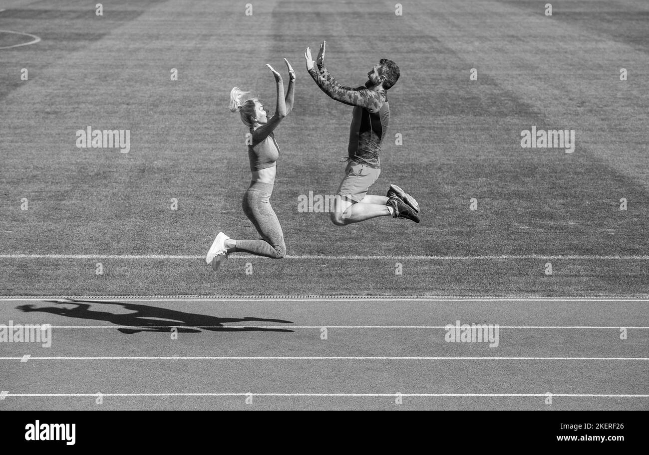 Couple jumping Black and White Stock Photos & Images - Alamy