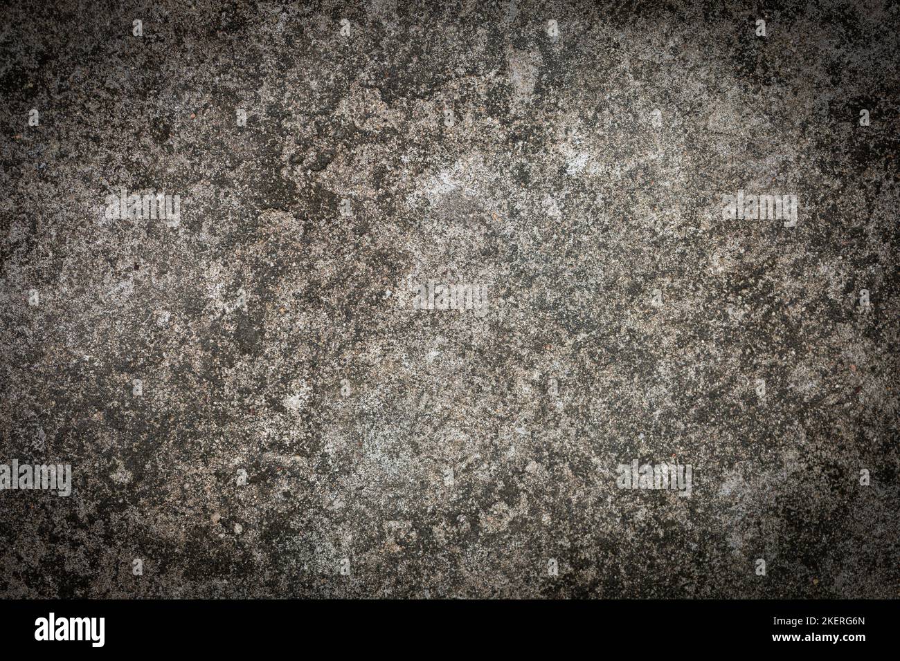Gray textured cement wall background with fine concrete chips ...