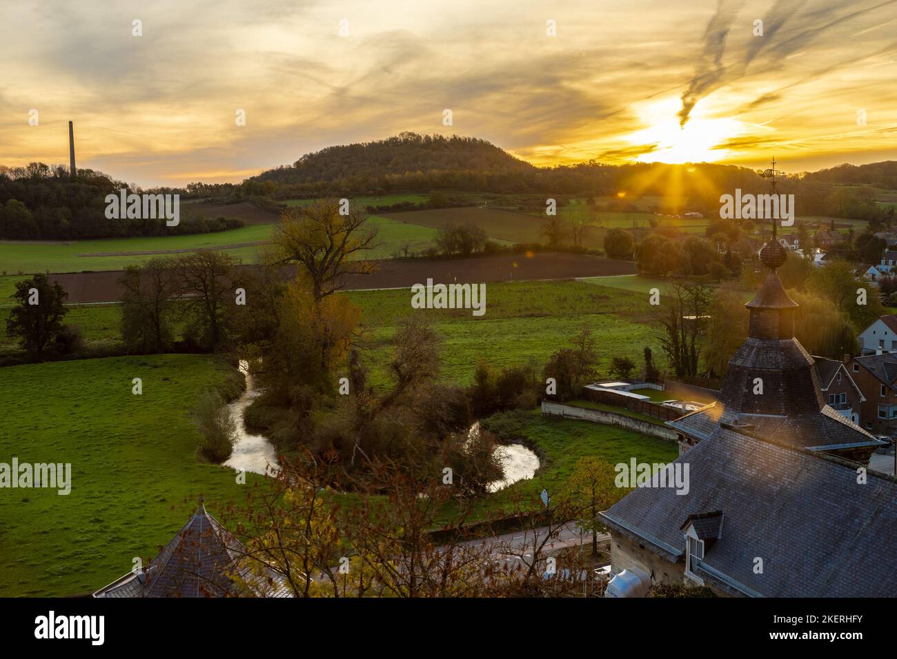 Jeker valley during a spectacular autumn sunrise with amazing sun beams ...