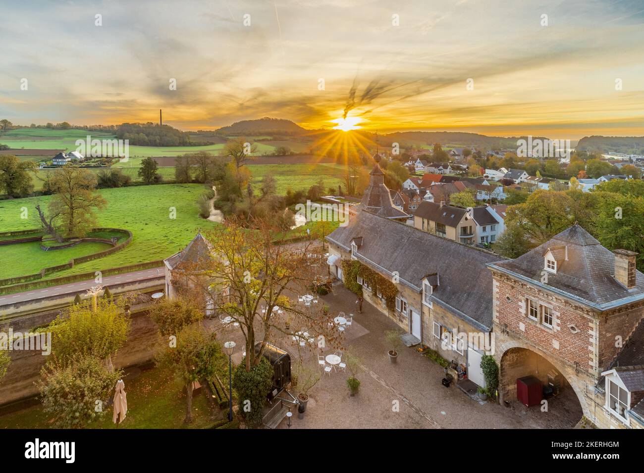 Jeker valley during a spectacular autumn sunrise with amazing sun beams ...