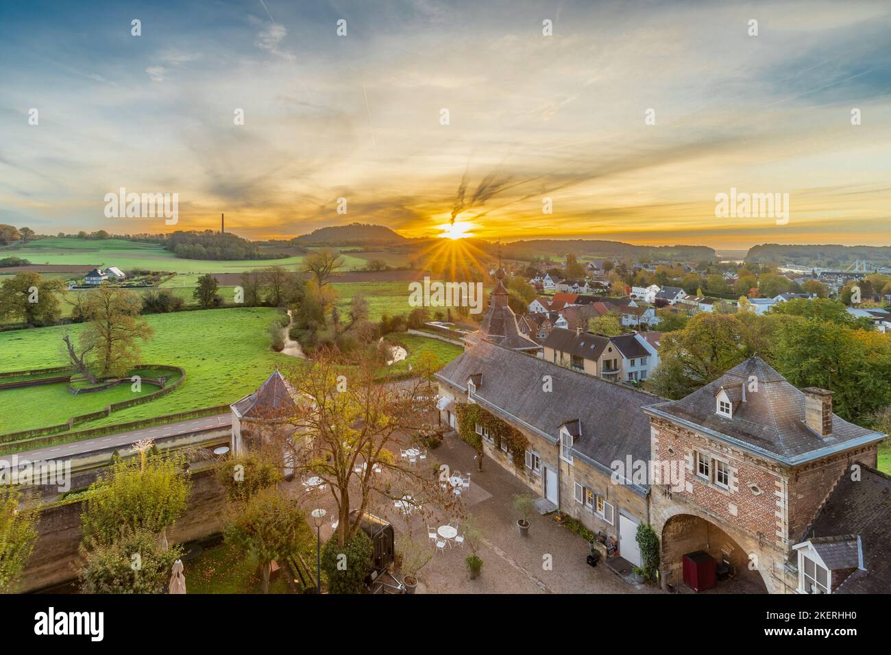 Jeker valley during a spectacular autumn sunrise with amazing sun beams ...