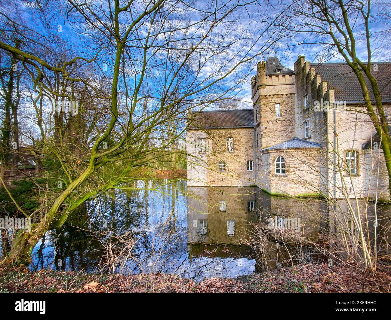 water castle with trees and reflections in water Stock Photo - Alamy