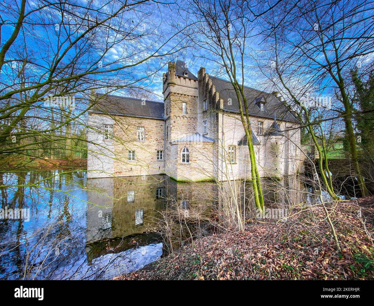 water castle with trees and reflections in water Stock Photo - Alamy