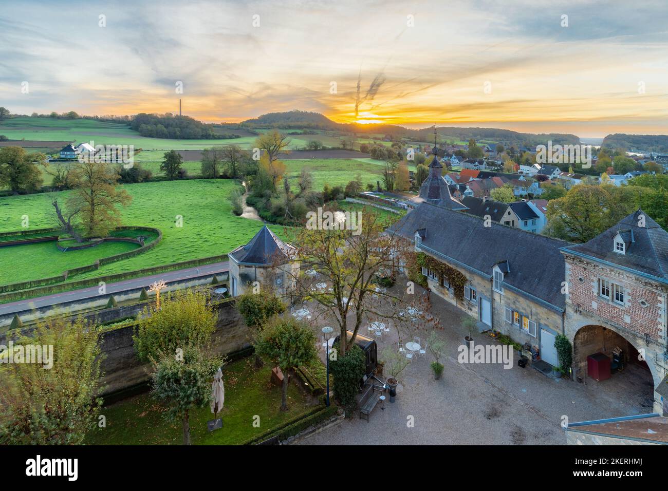 Jeker valley during a spectacular autumn sunrise with amazing sun beams ...