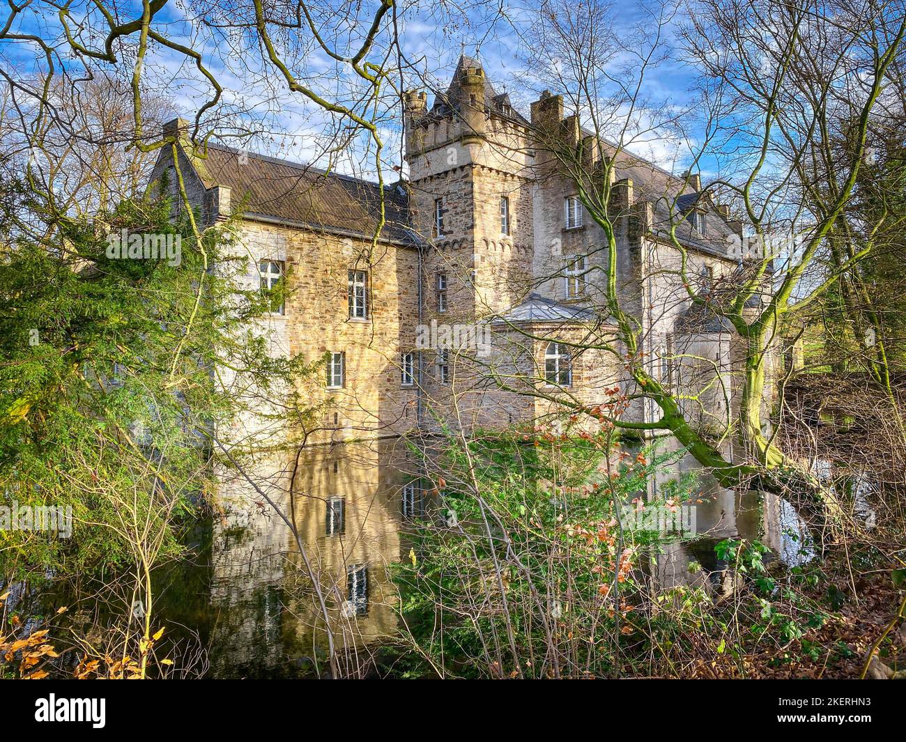 water castle with trees and reflections in water Stock Photo - Alamy