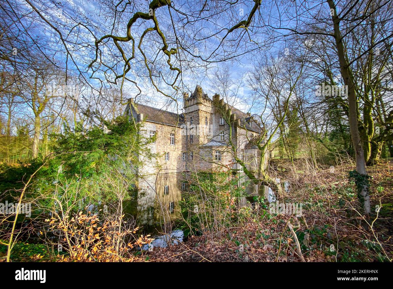 water castle with trees and reflections in water Stock Photo - Alamy