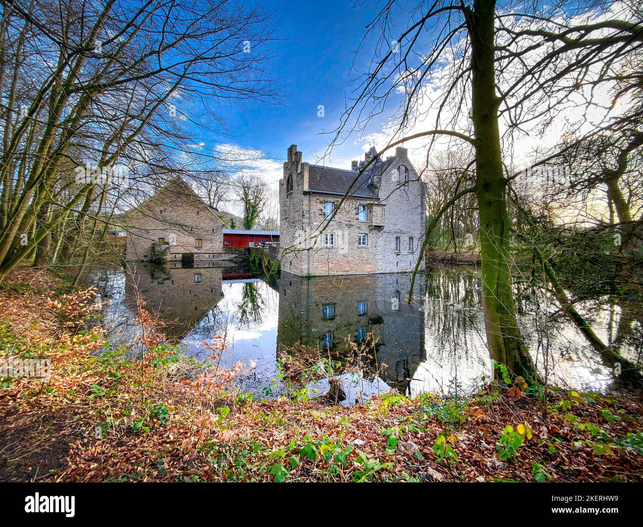 water castle with trees and reflections in water Stock Photo - Alamy