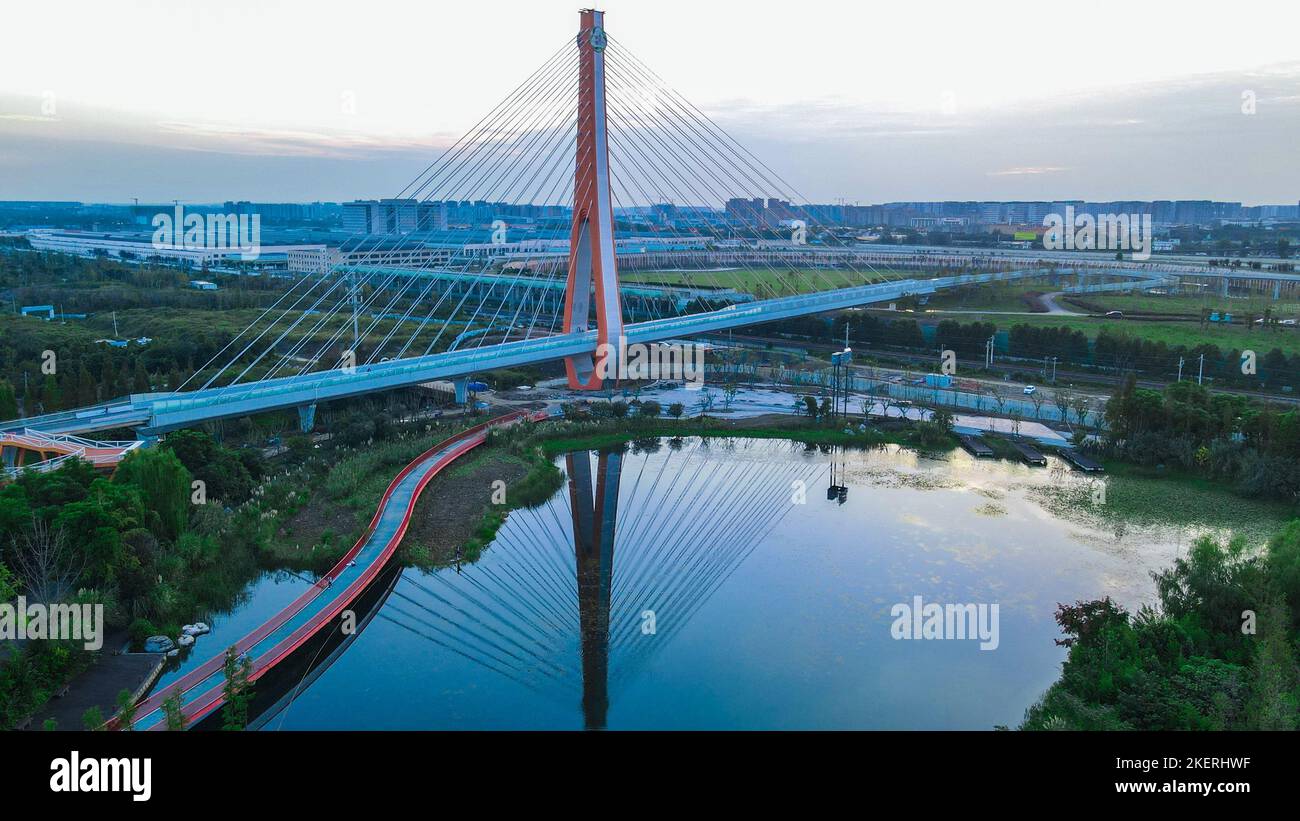 Aerial photos show the Chengkun Bridge which is the largest pedestrian ...