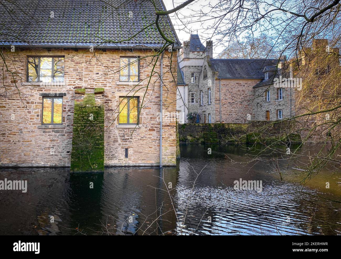 water castle with trees and reflections in water Stock Photo - Alamy