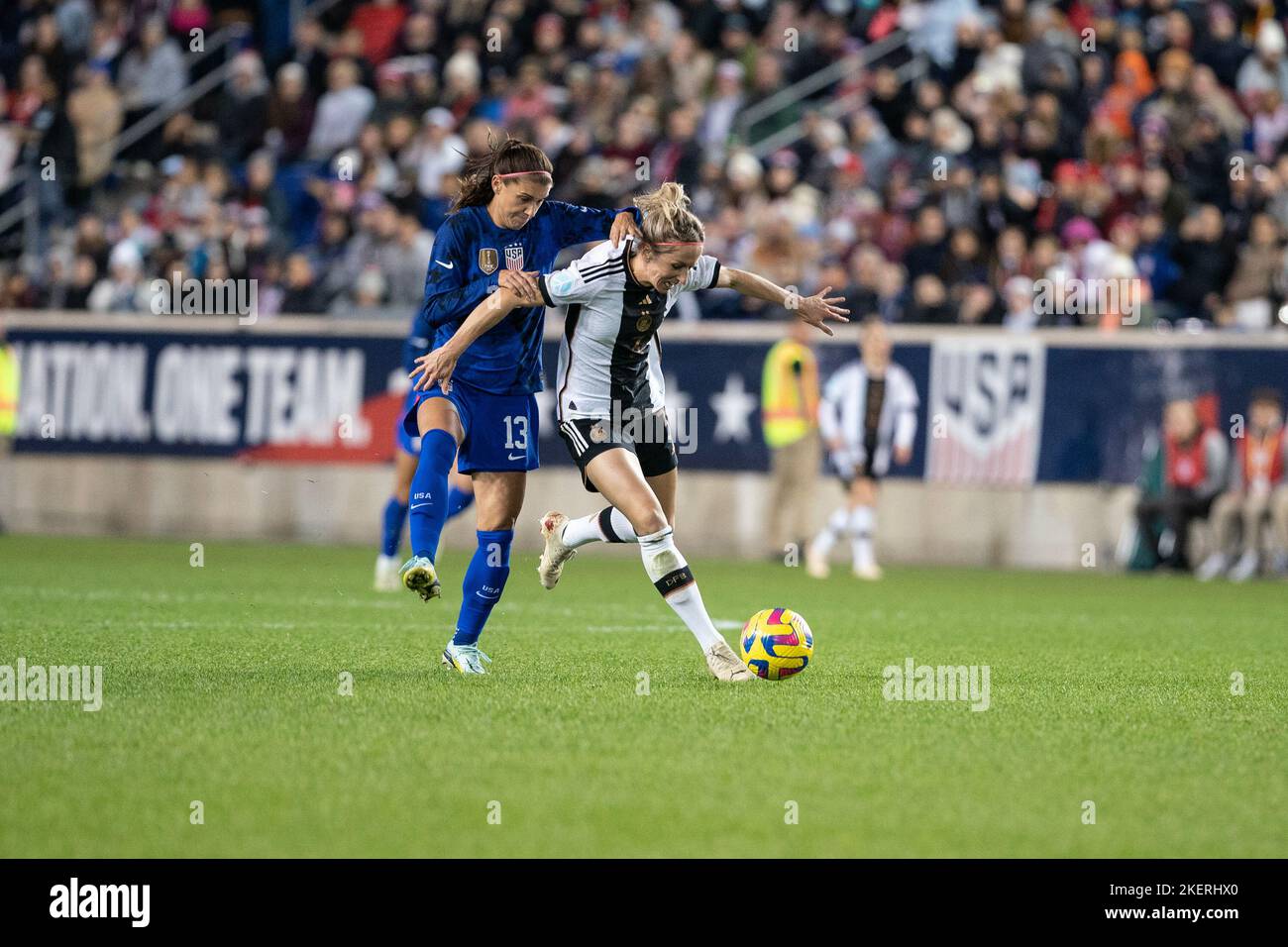 Alex Morgan (13) of USWNT Kathrin Hendrich (3) of Germany fight for ...