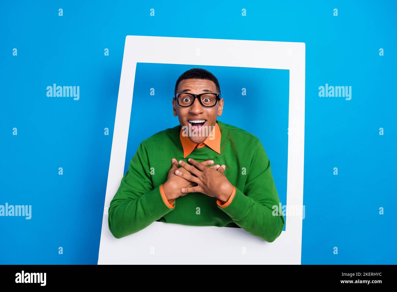 Portrait paper frame cadre of excited satisfied glad man wear ...