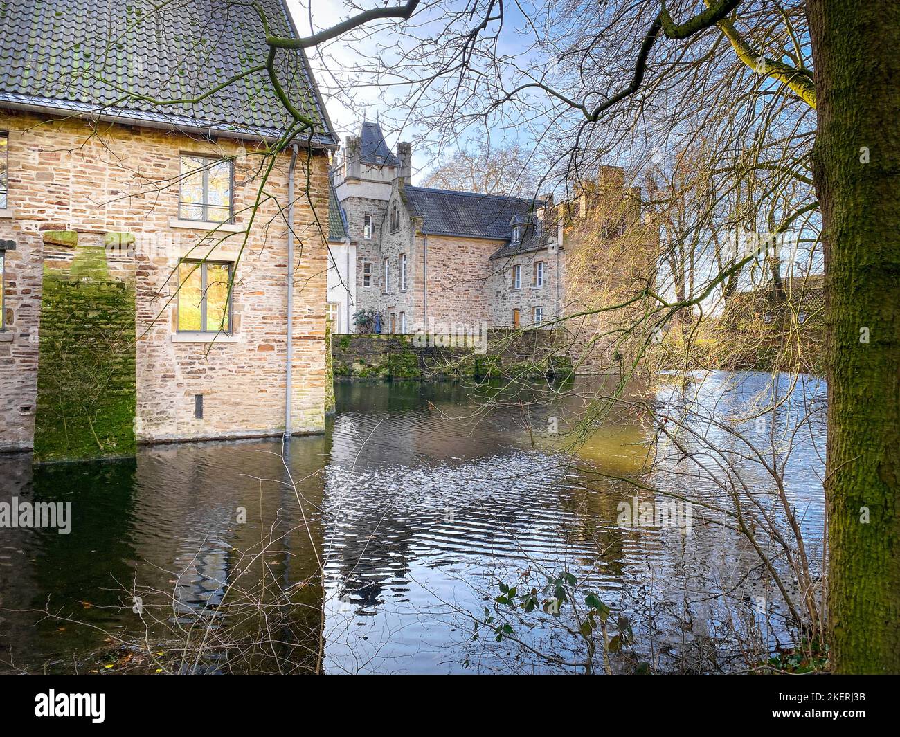 water castle with trees and reflections in water Stock Photo - Alamy