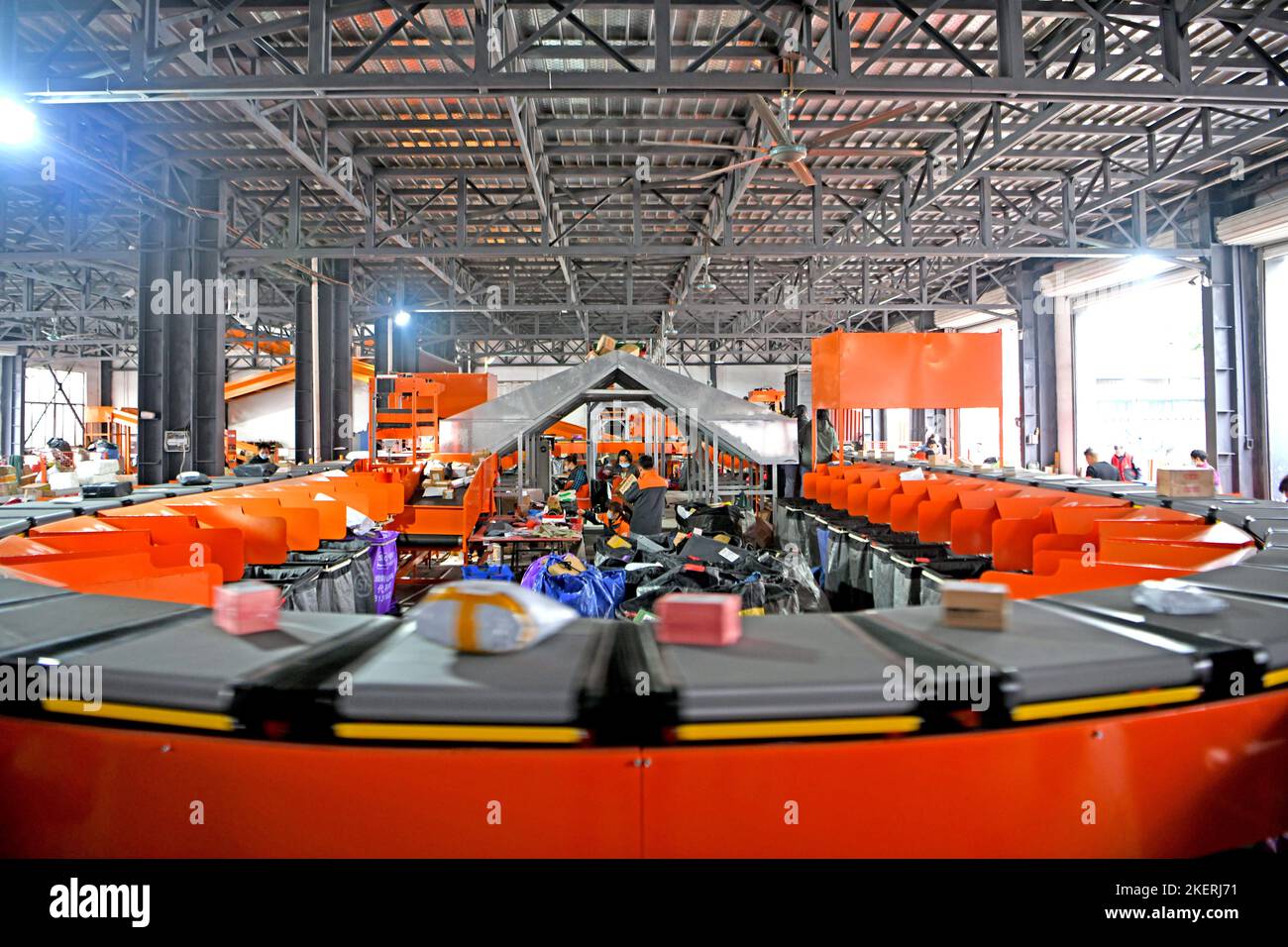 The Shunfeng Express workers are sorting parcels in the warehouse ...