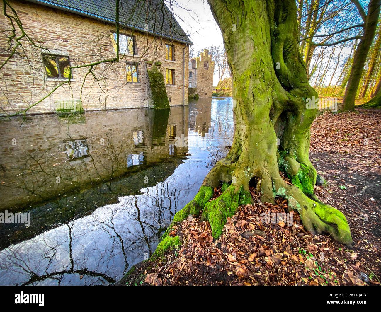 water castle with trees and reflections in water Stock Photo - Alamy