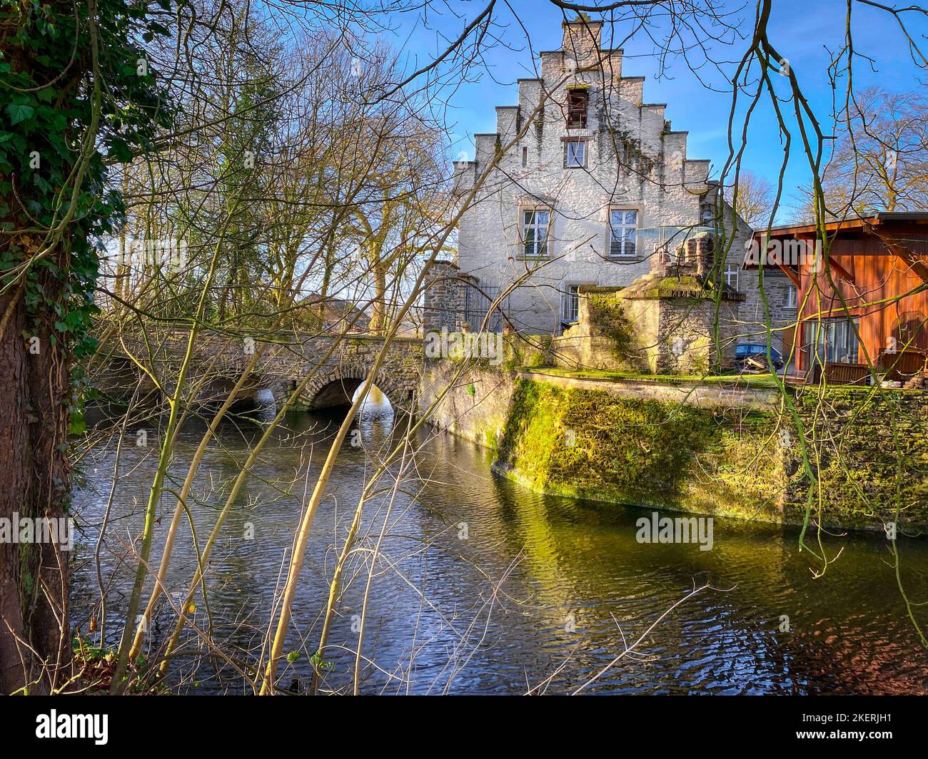 water castle with trees and reflections in water Stock Photo - Alamy