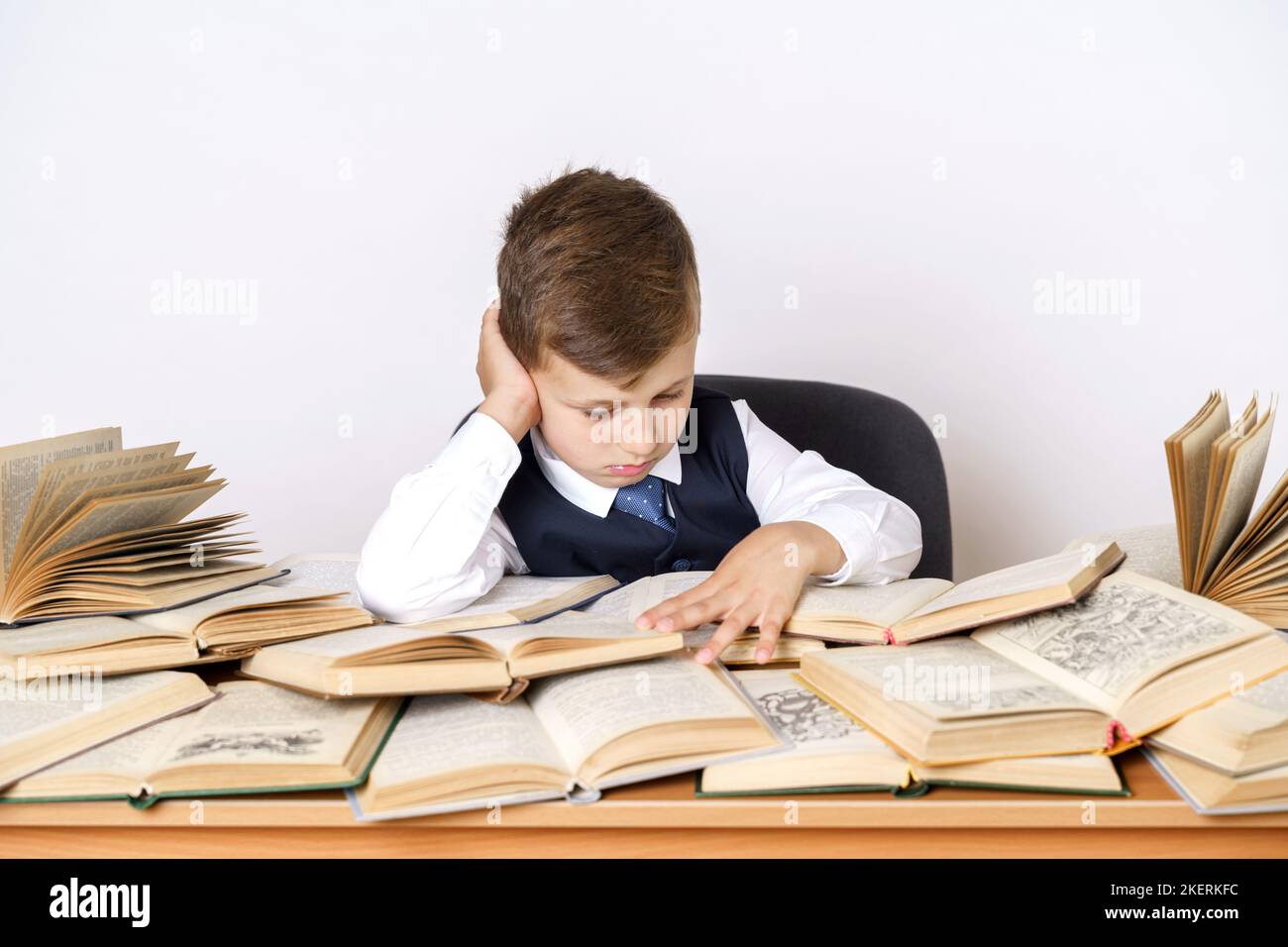 Schoolchild homework uniform hi-res stock photography and images - Alamy