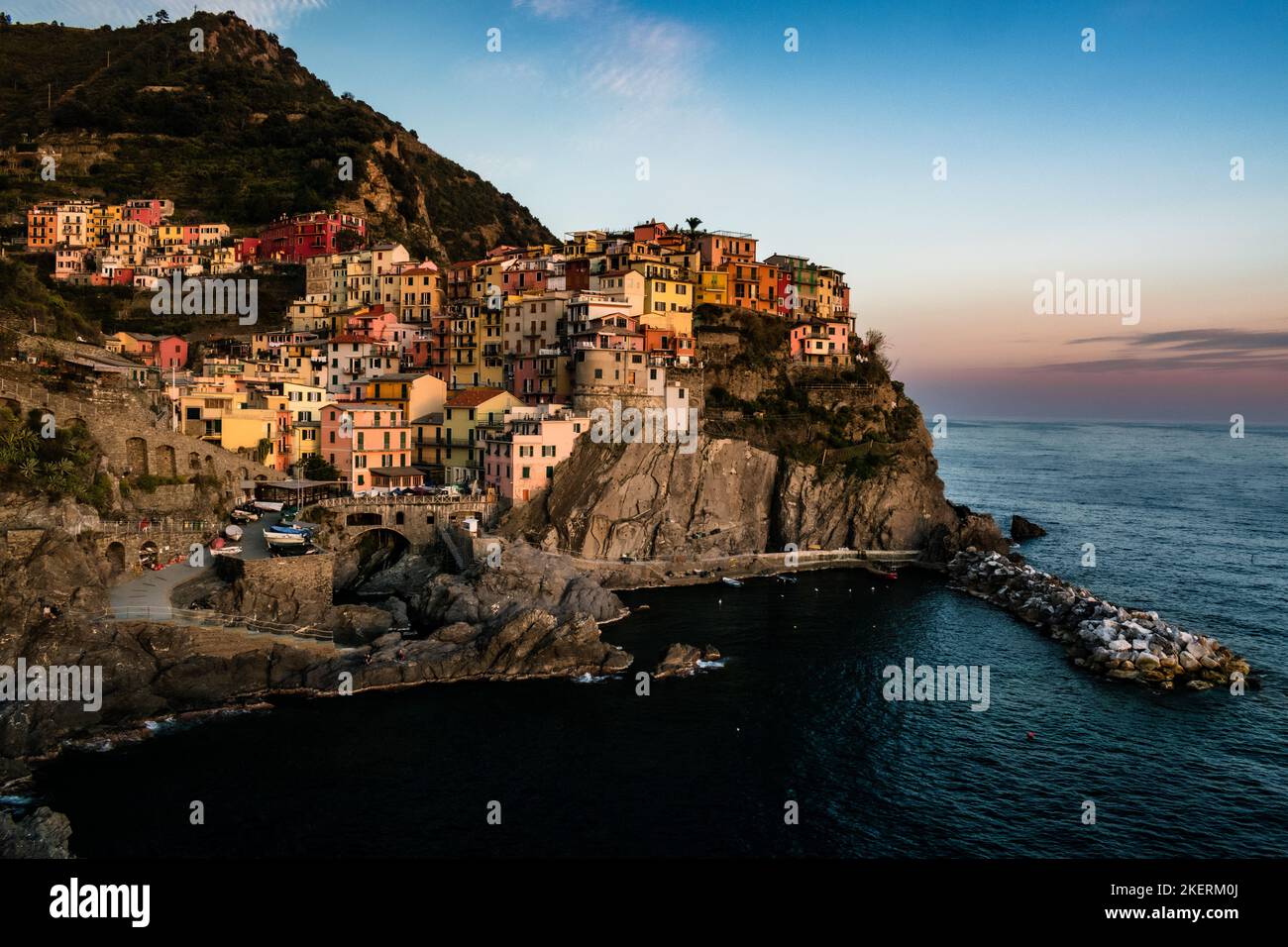 A wide view of a typical Italian village Manarola during sunset Stock ...