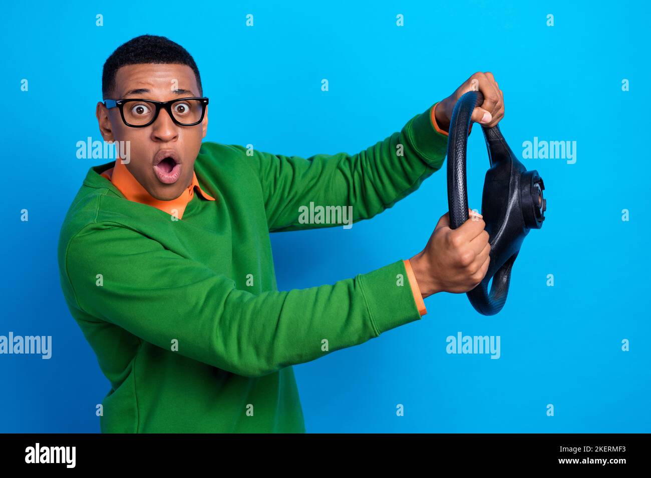 Side profile photo of young nervous student guy trying learn driving ...