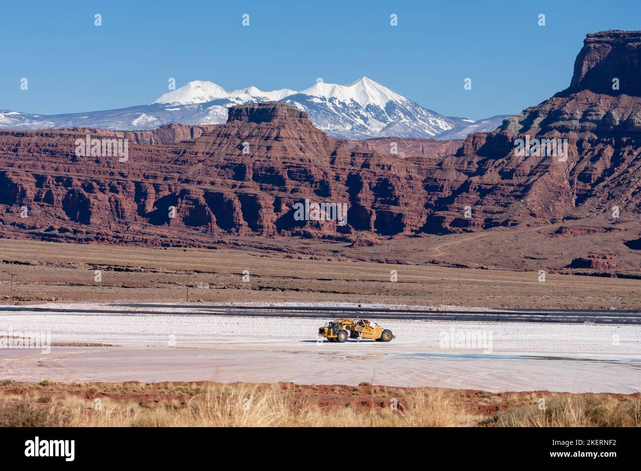 A heavy-duty scraper harvesting potash from an evaporation pond at a ...